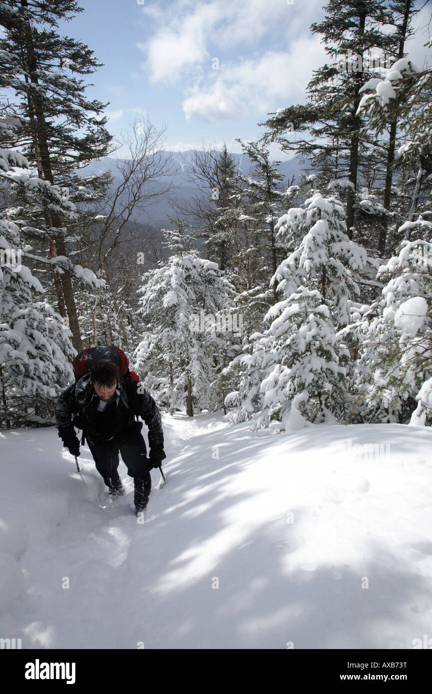 Hikers snowshoeing on the Hancock Loop Trail in the White Mountains New ...
