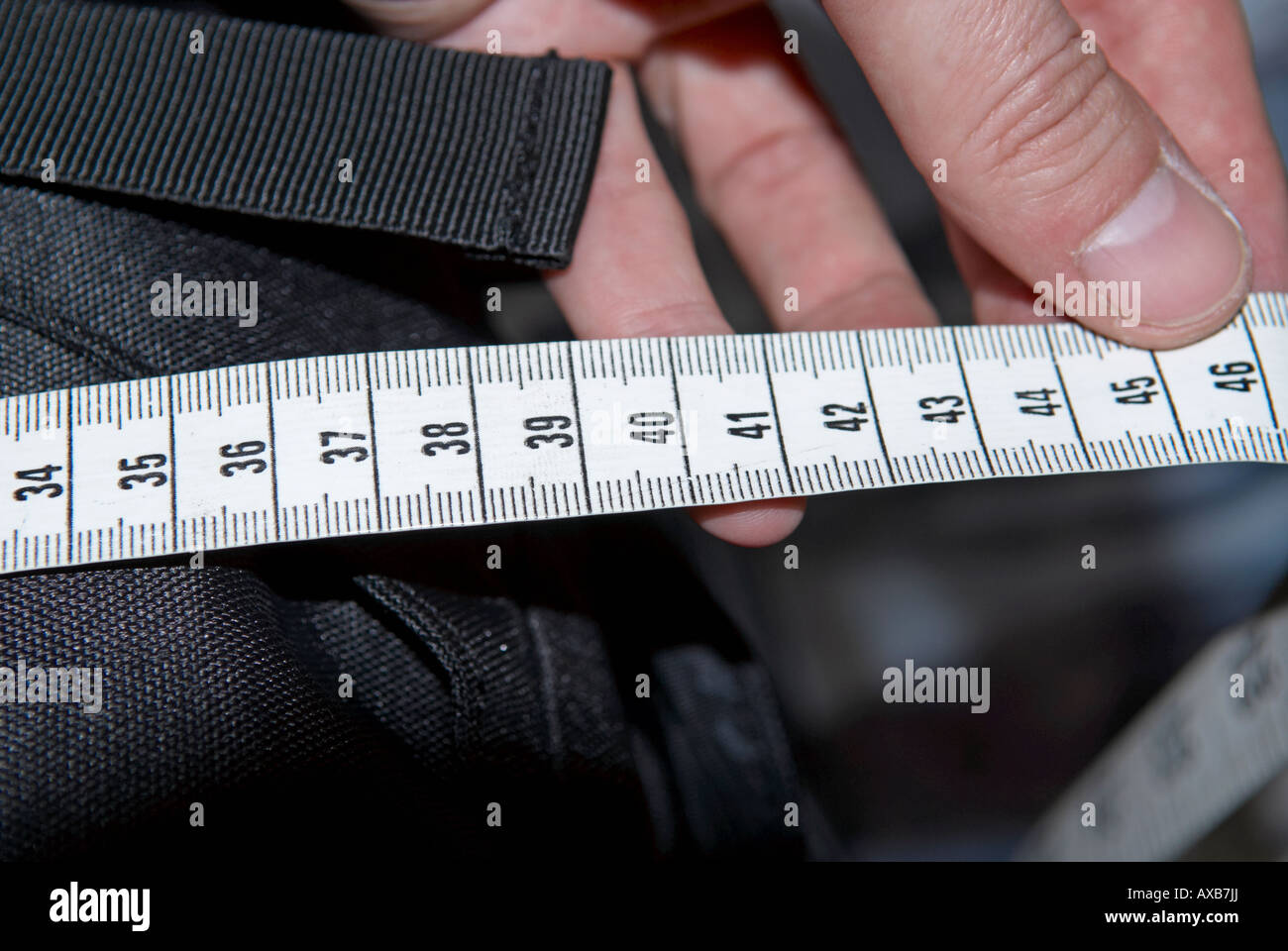 Using a Tape measure Stock Photo - Alamy