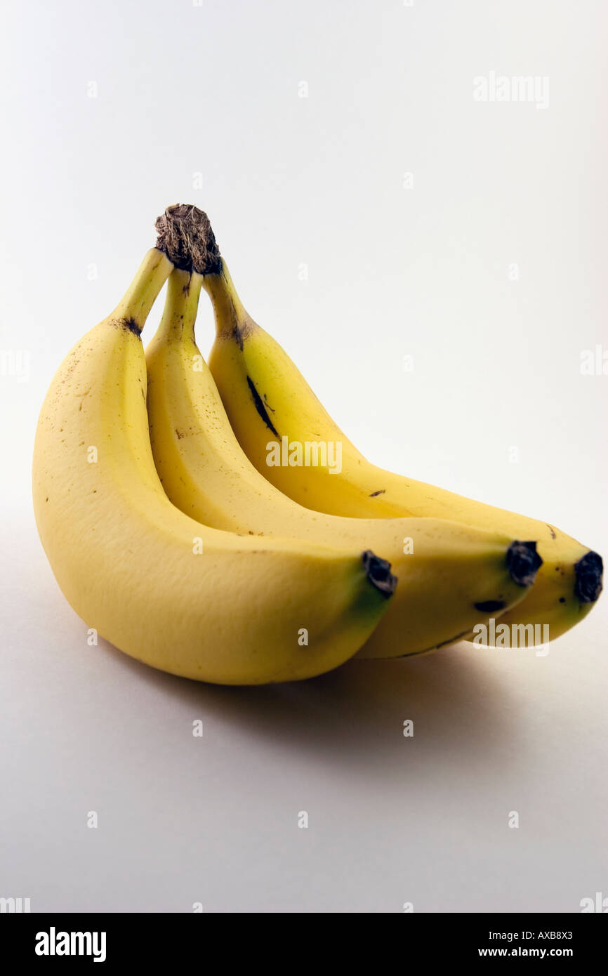 Bunch yellow bananas fruit Cut Out Stock Images & Pictures - Alamy