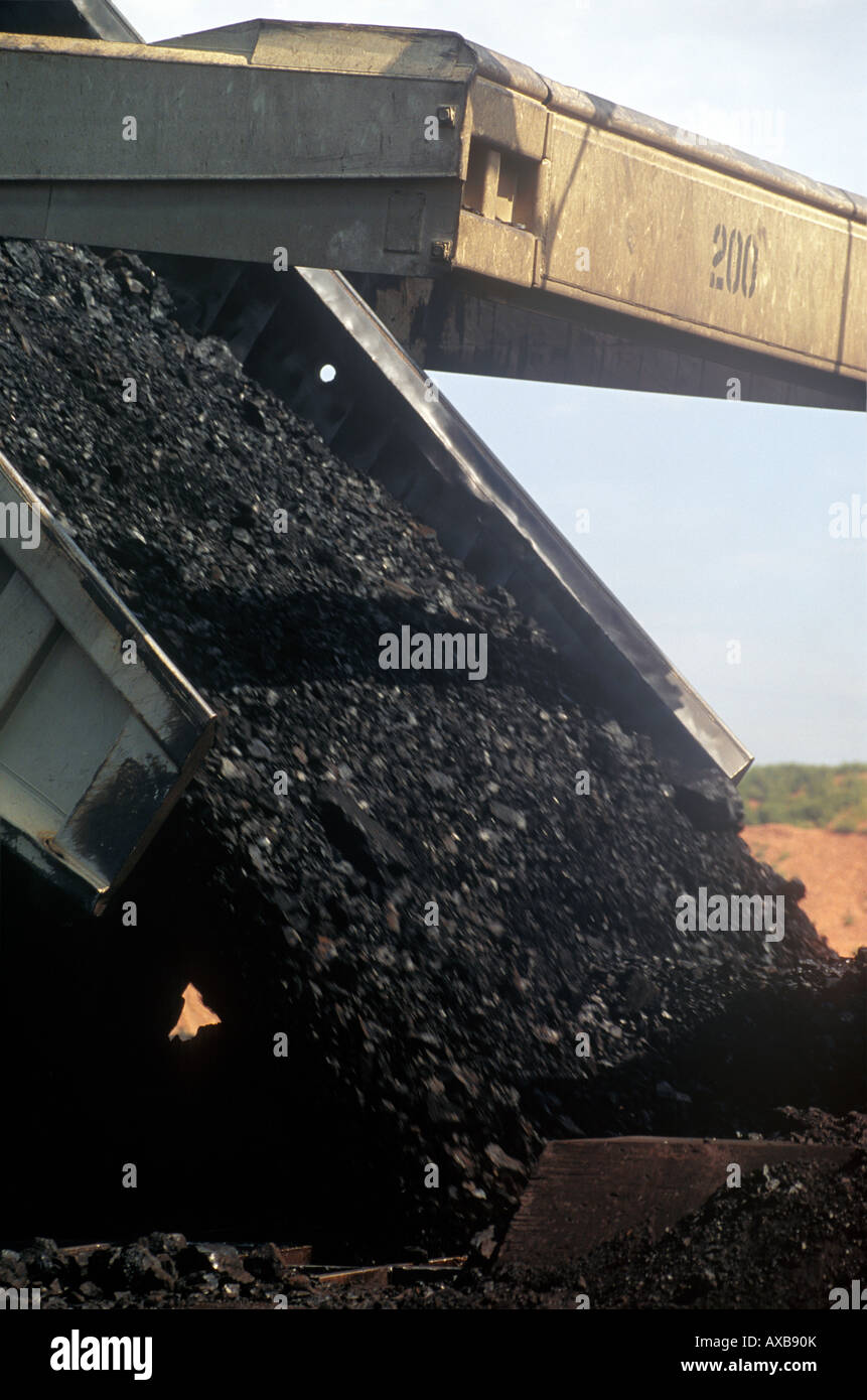 Haul truck dumping coal at surface coal mine Stock Photo - Alamy