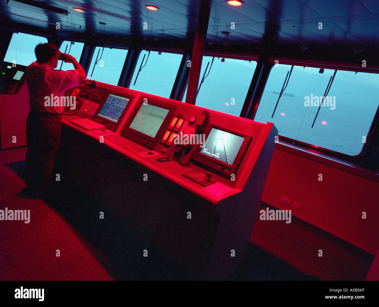 Screens and radars on the command bridge of the Queen Mary 2, Cruise ...