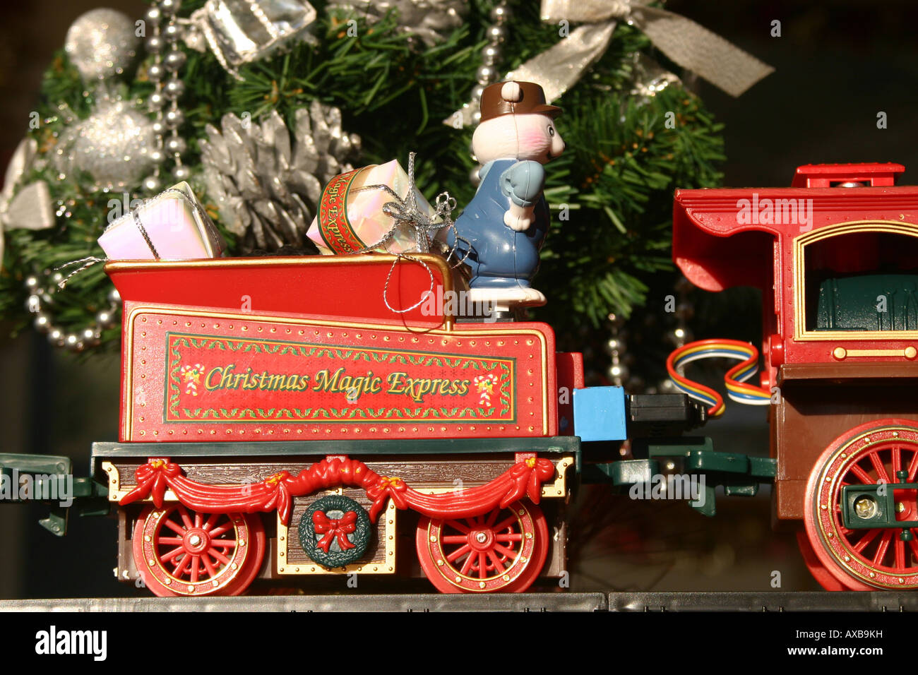 christmas xmas santa claus toy present train rail Stock Photo - Alamy