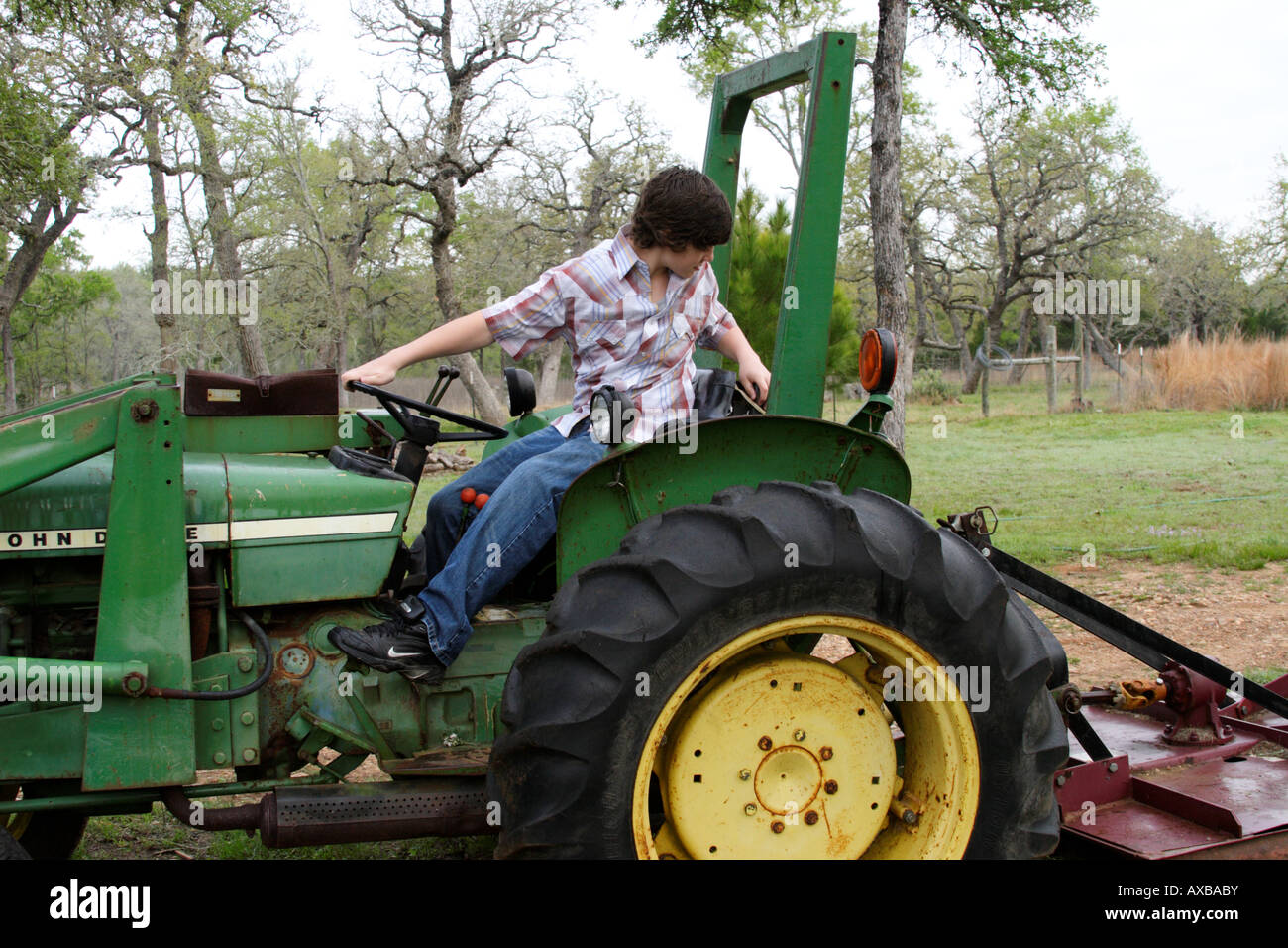 Maintenance farm teenage john deer hi-res stock photography and images ...