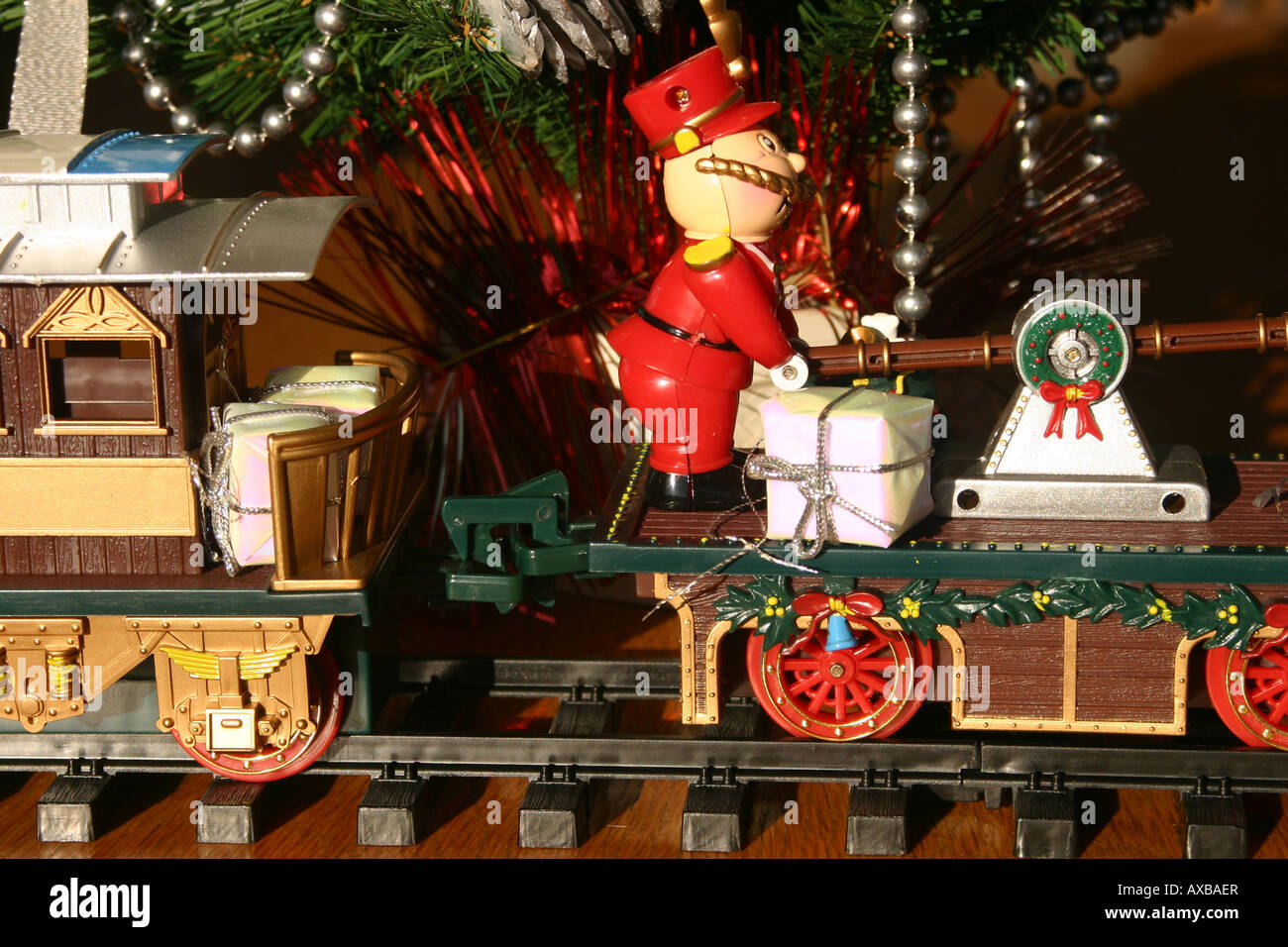 christmas xmas santa claus toy present train rail Stock Photo - Alamy