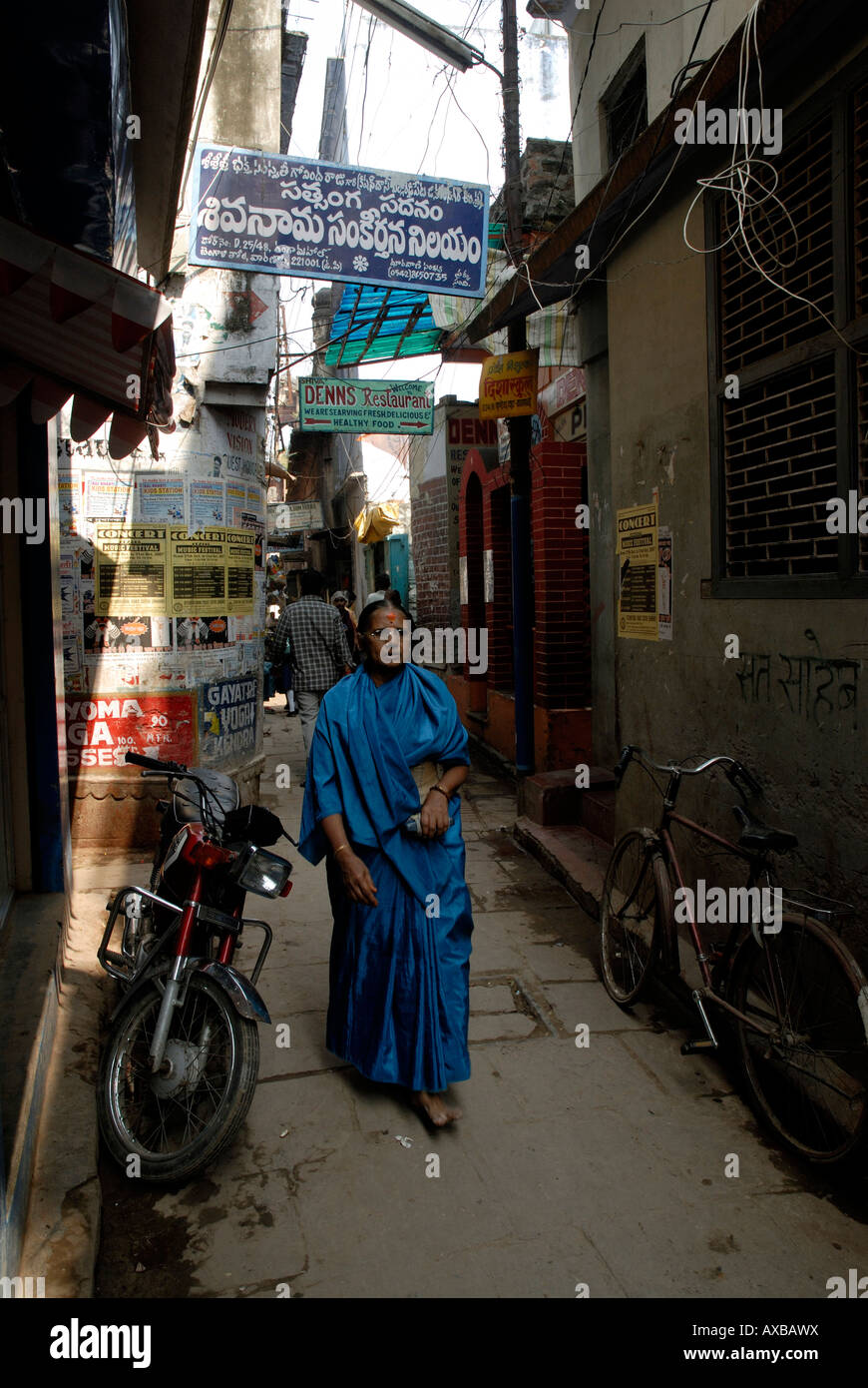 The narrow streets of old town Varanasi India Stock Photo - Alamy