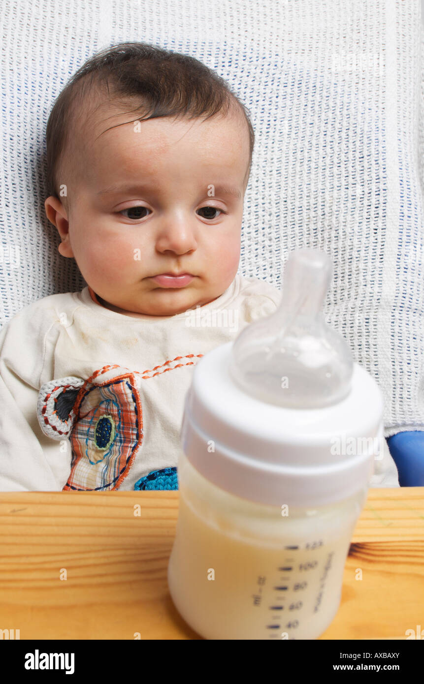 Baby milk botle food feed bib meal hi-res stock photography and images ...