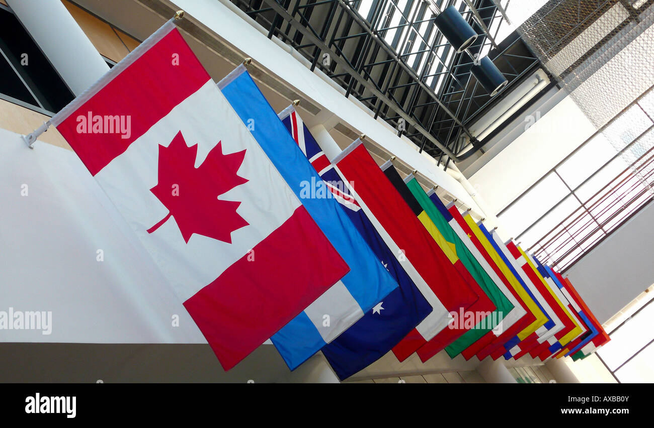 Various hanging international flags Stock Photo - Alamy