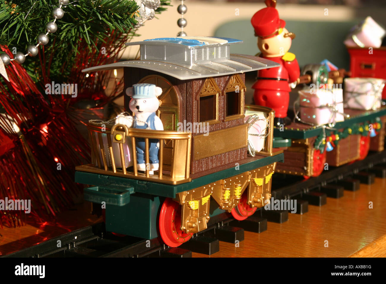 christmas xmas santa claus toy present train rail Stock Photo - Alamy