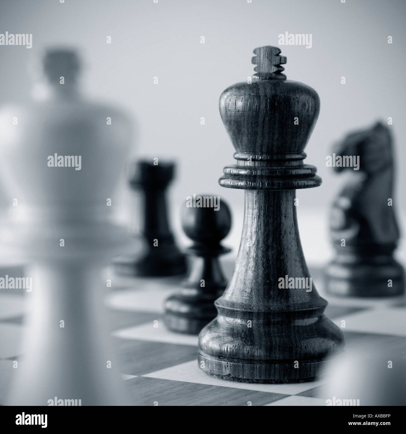 Traditional wooden chess game pieces on board Stock Photo - Alamy