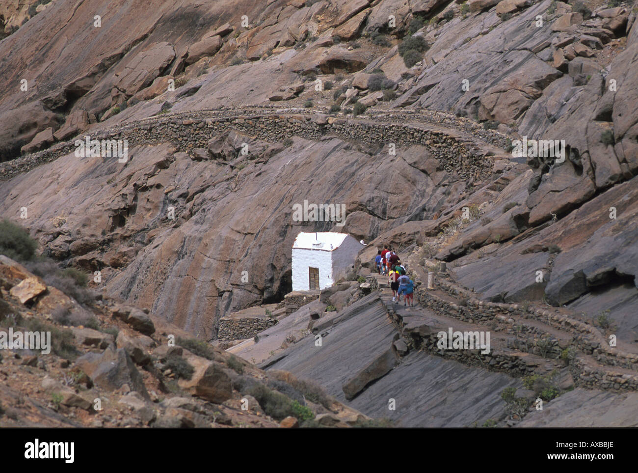 Group walking over rock hi-res stock photography and images - Alamy