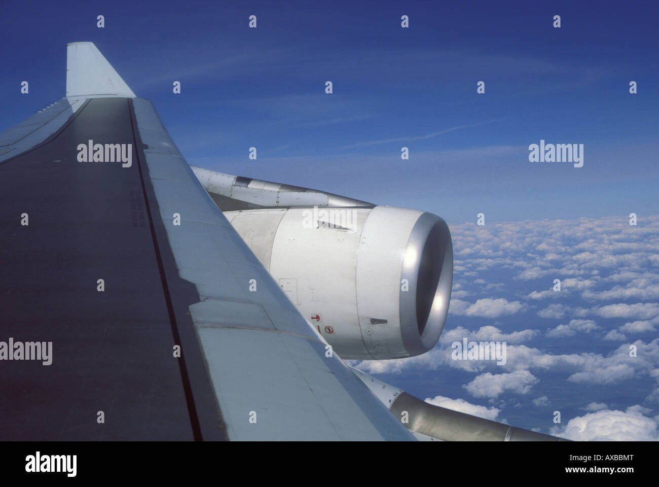 View of jet aircraft wing through aircraft window Stock Photo - Alamy