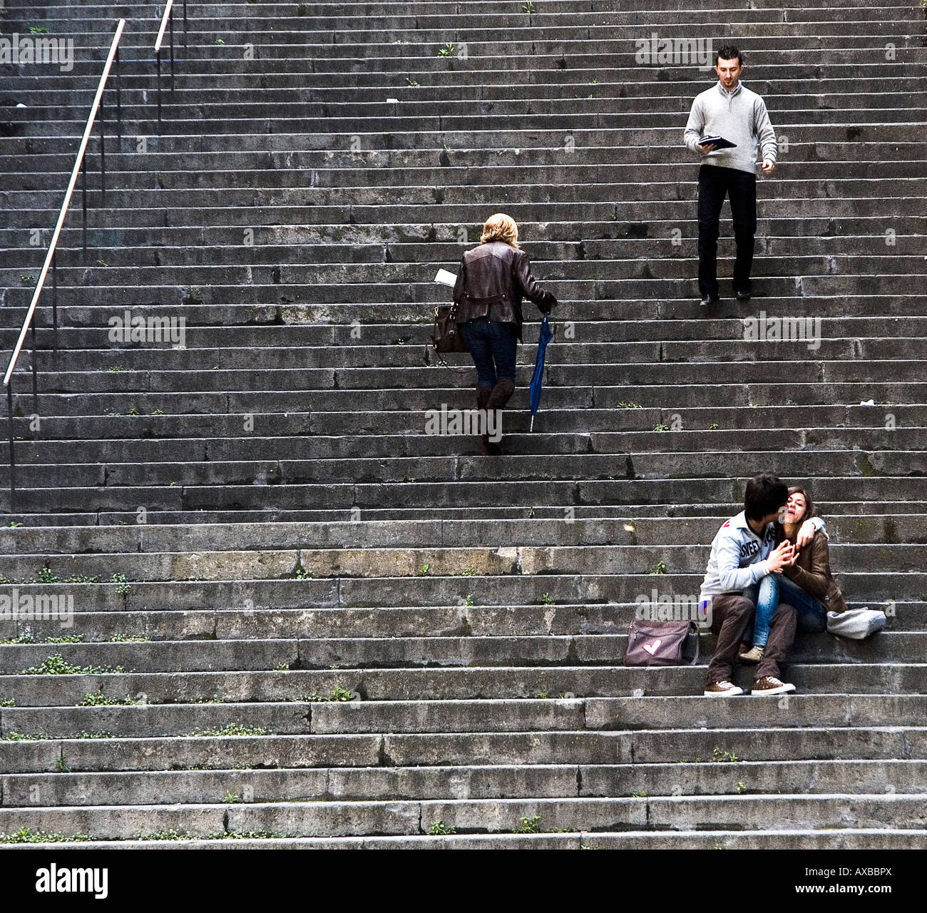 a young Italian couple kissing on steps in Naples Italy Stock Photo - Alamy