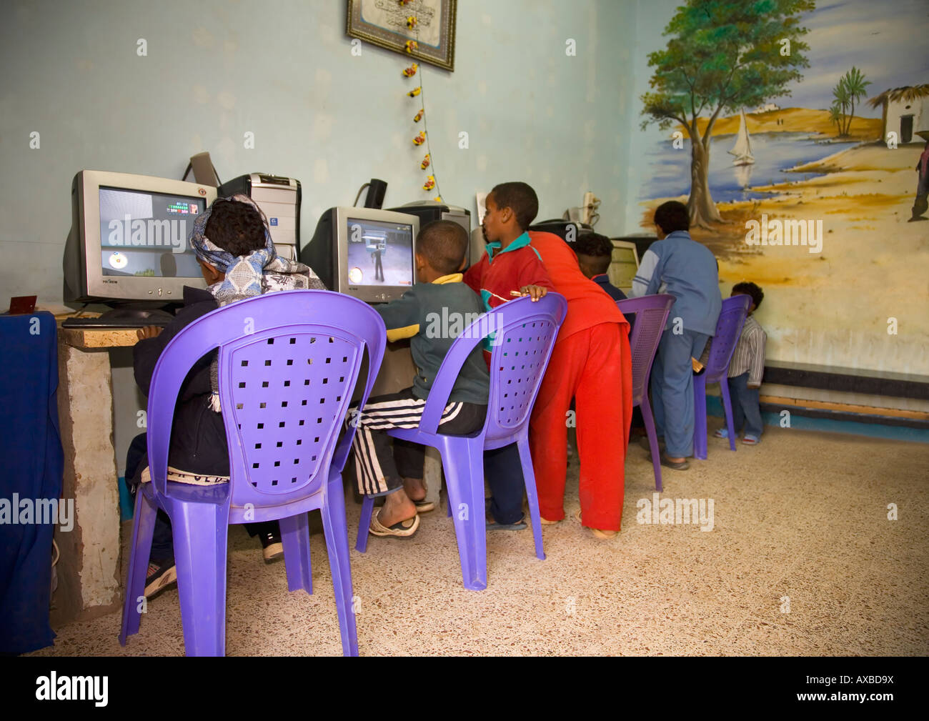 Young african children playing on computers Nubia Aswan Egypt North ...