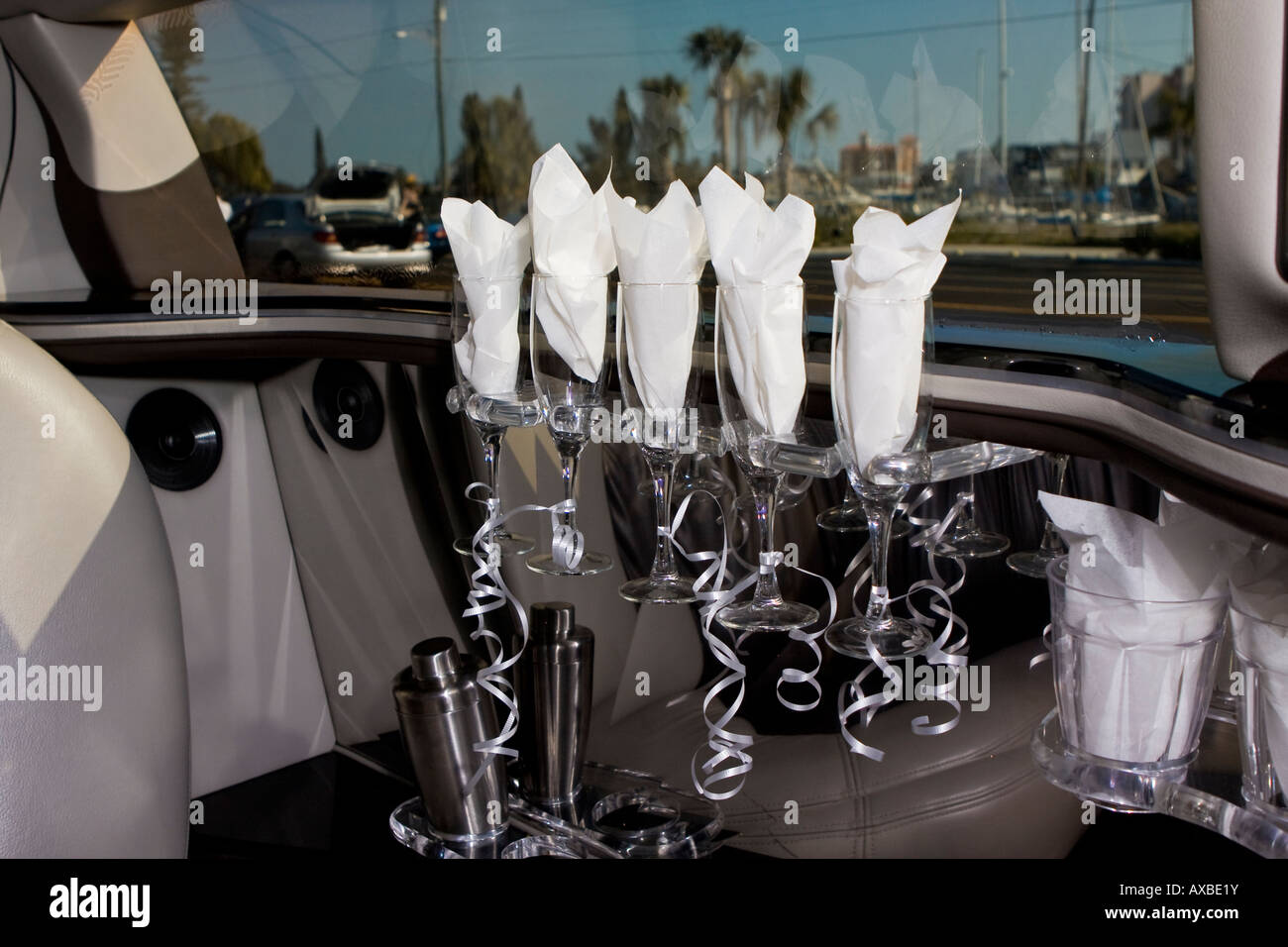Five Champagne Flutes with Cloth Napkins in the Rear of a Limousine ...