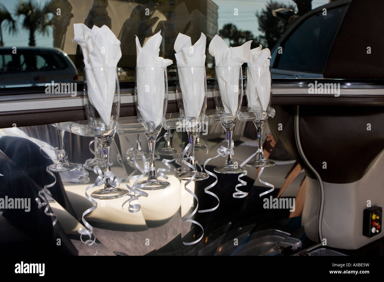 Five Champagne Flutes with Cloth Napkins in the Rear of a Limousine ...