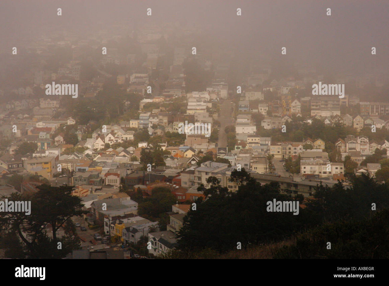 The Castro neighborhood in a foggy day view from Twin Peaks San ...