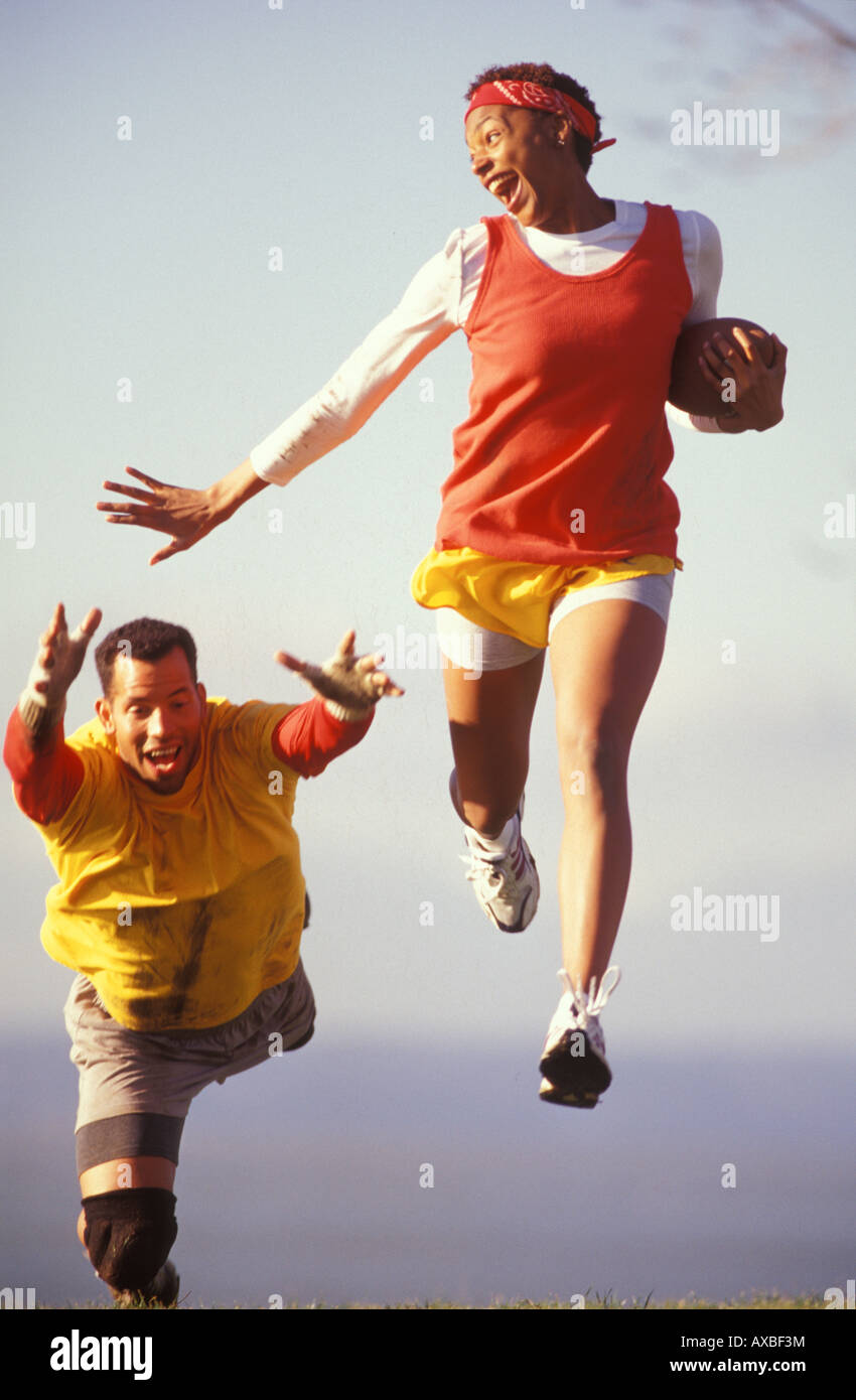 An African American couple of college students play a vigorous game of ...