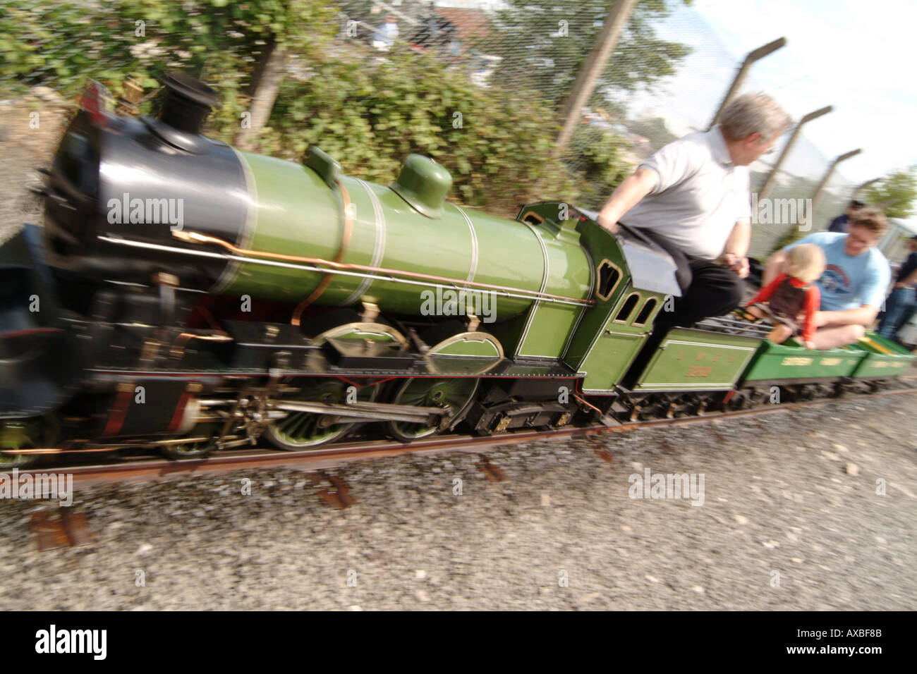 miniture steam train flying scotsman train ride ri Stock Photo - Alamy