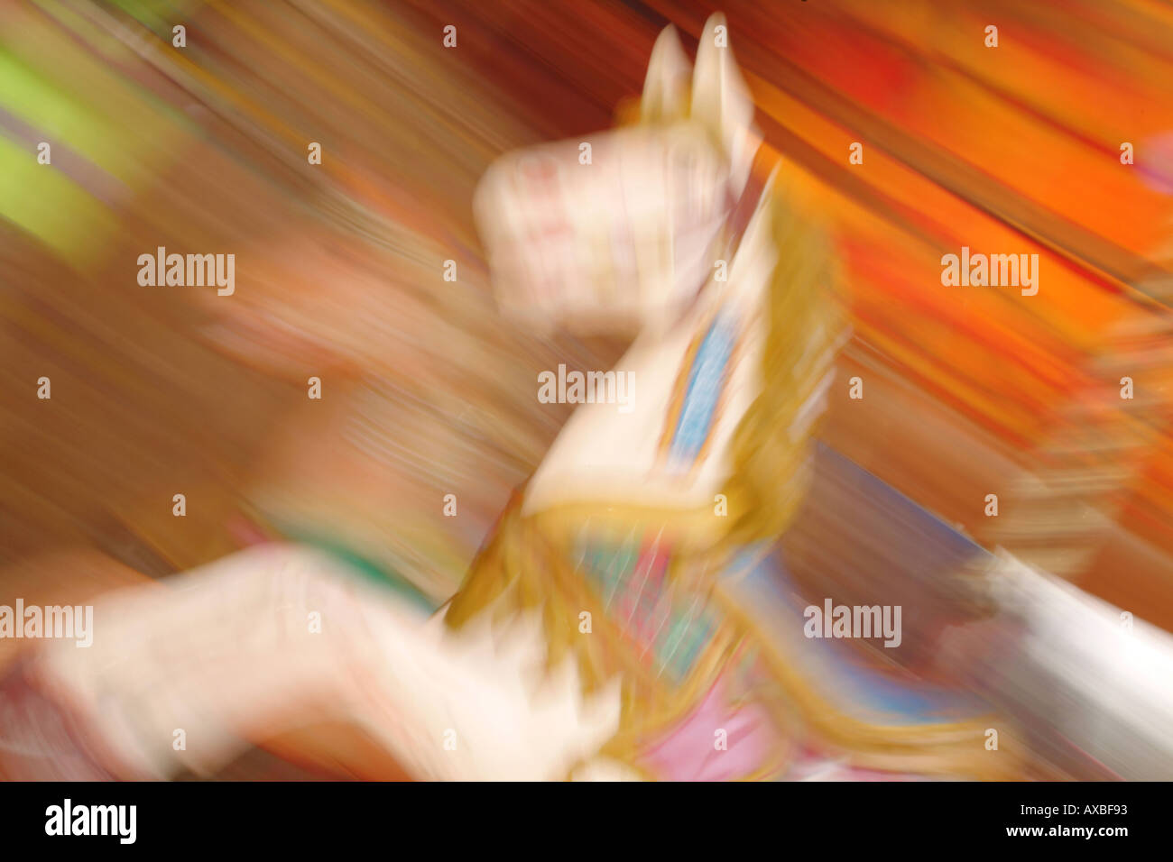 childhood concept blur movement carosel horse ride fair ground fun fair ...