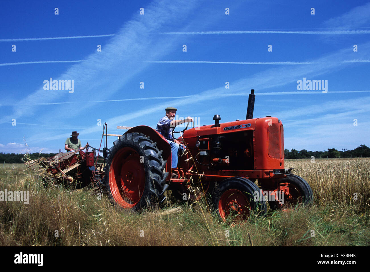 Tractor pulling combine hi-res stock photography and images - Alamy