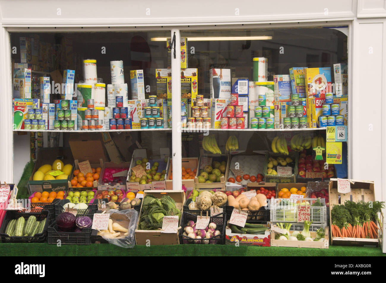 Traditional village grocery shop with produce and tinned provisions ...