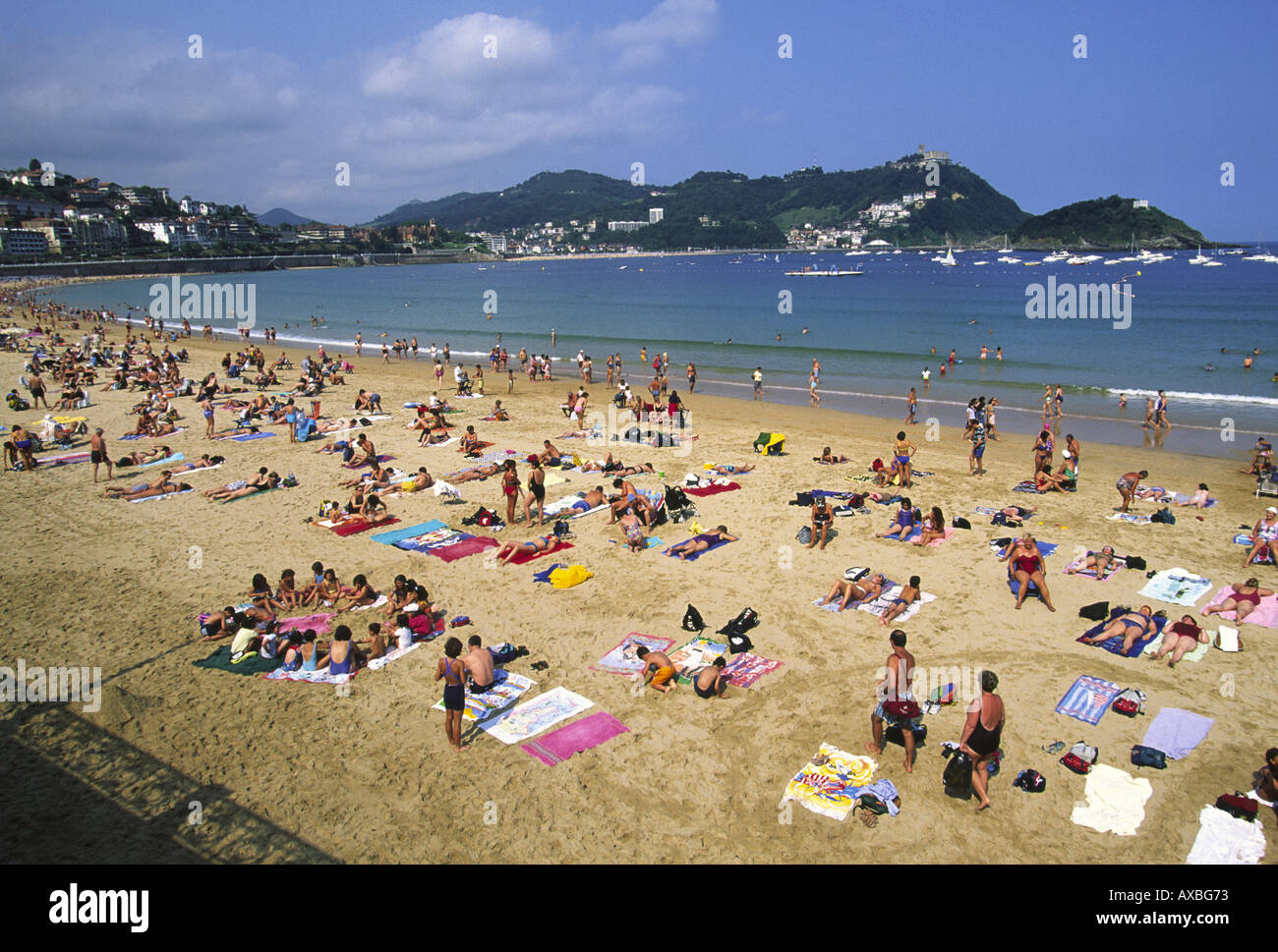 Crowded beach scene swimmers city hi-res stock photography and images ...