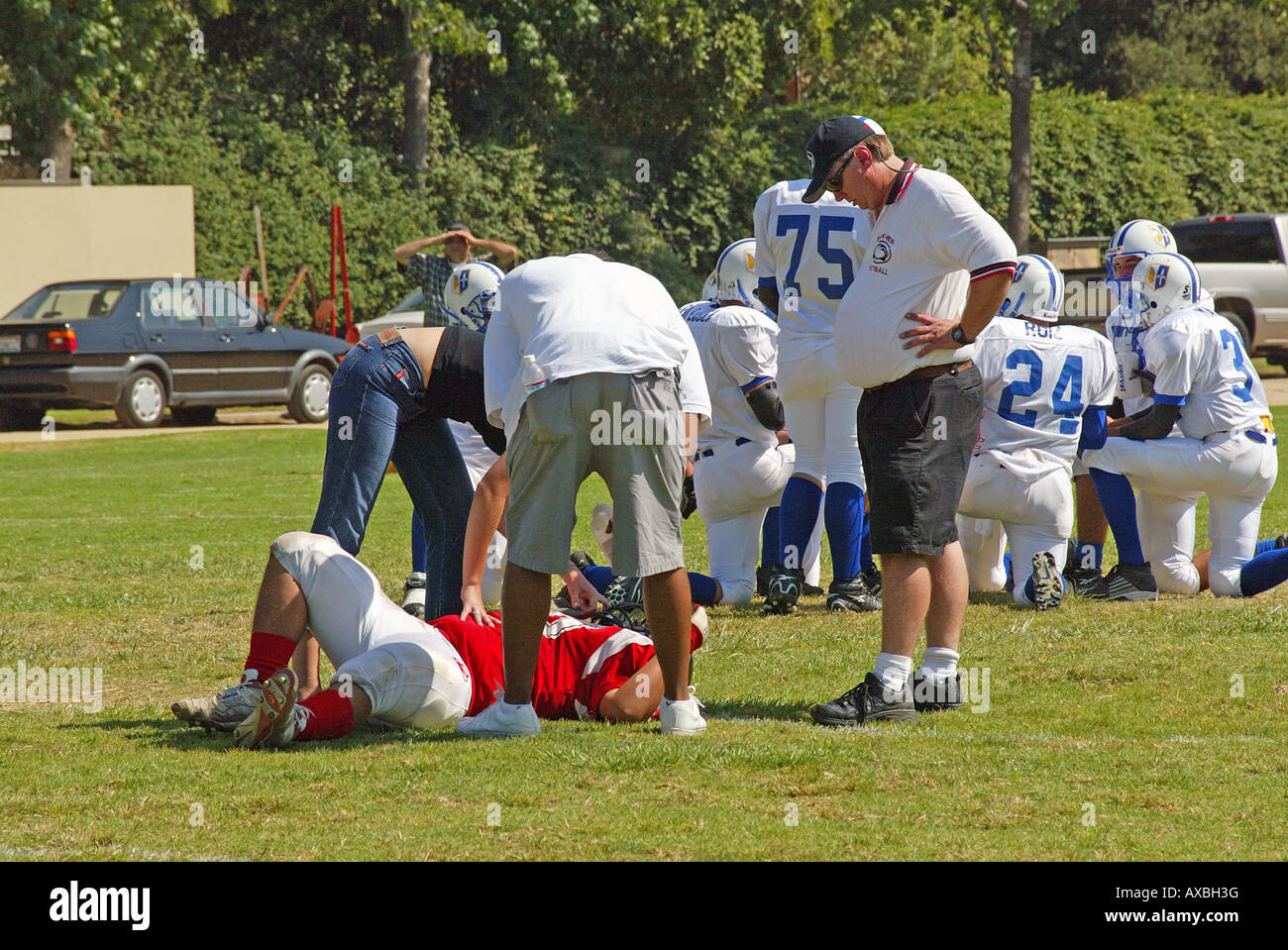 High school football game action Stock Photo - Alamy