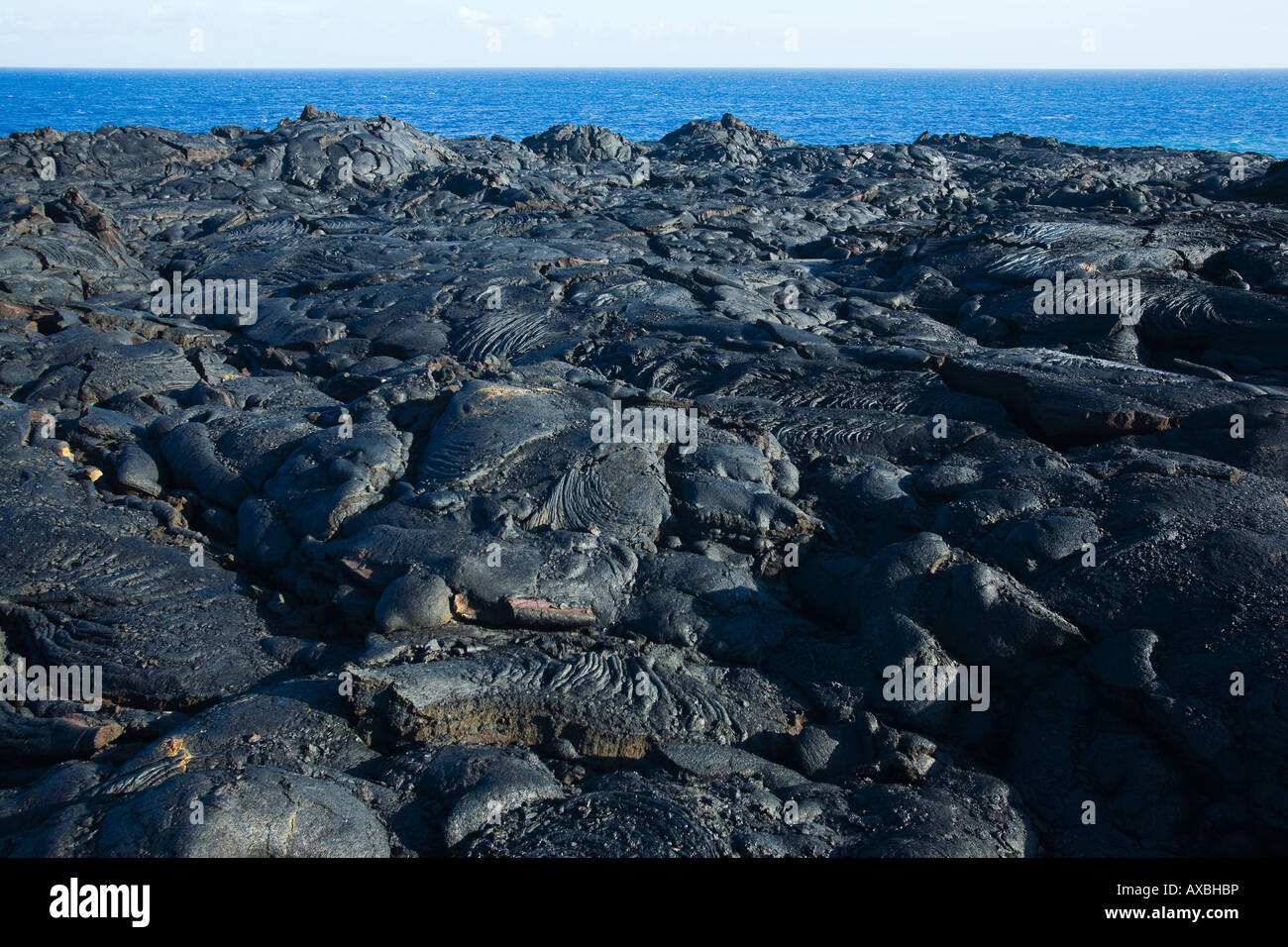 A a lava flow near the Pacific Ocean in Hawai'i Volcanoes National Park ...