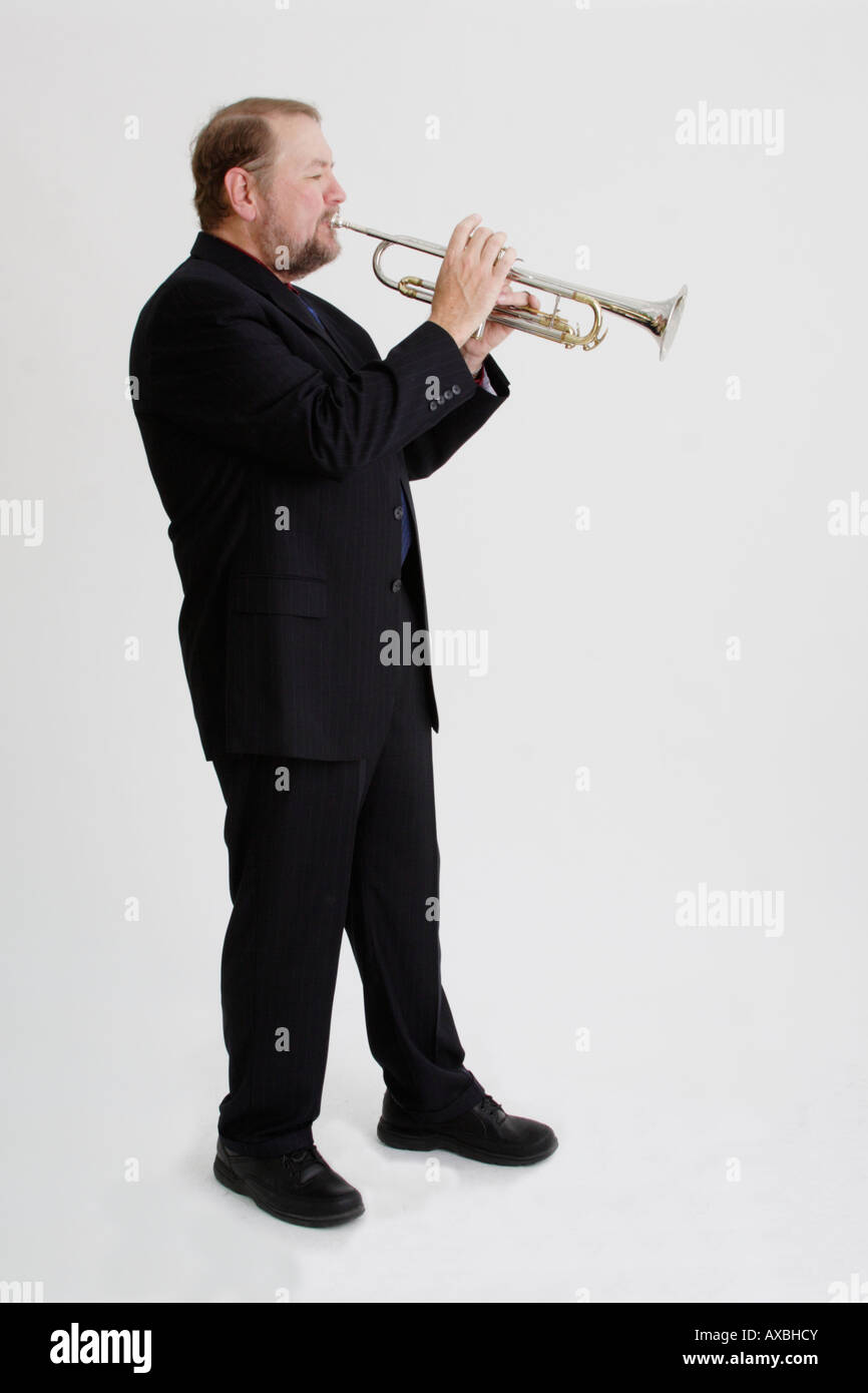 Blowing trumpet hi-res stock photography and images - Alamy