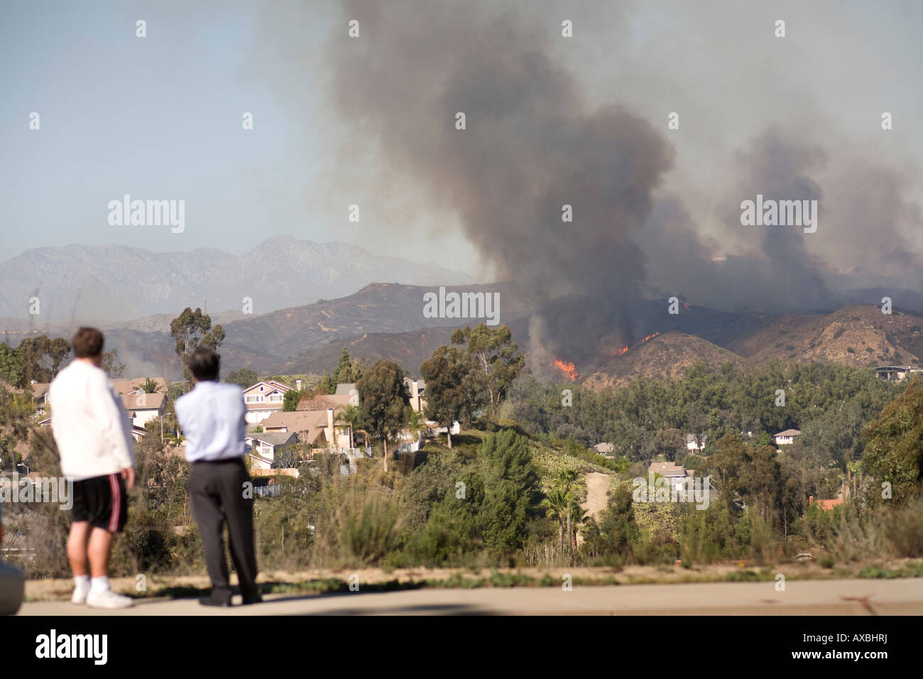 Brush fire in hills of Orange, California threaten homes Stock Photo ...