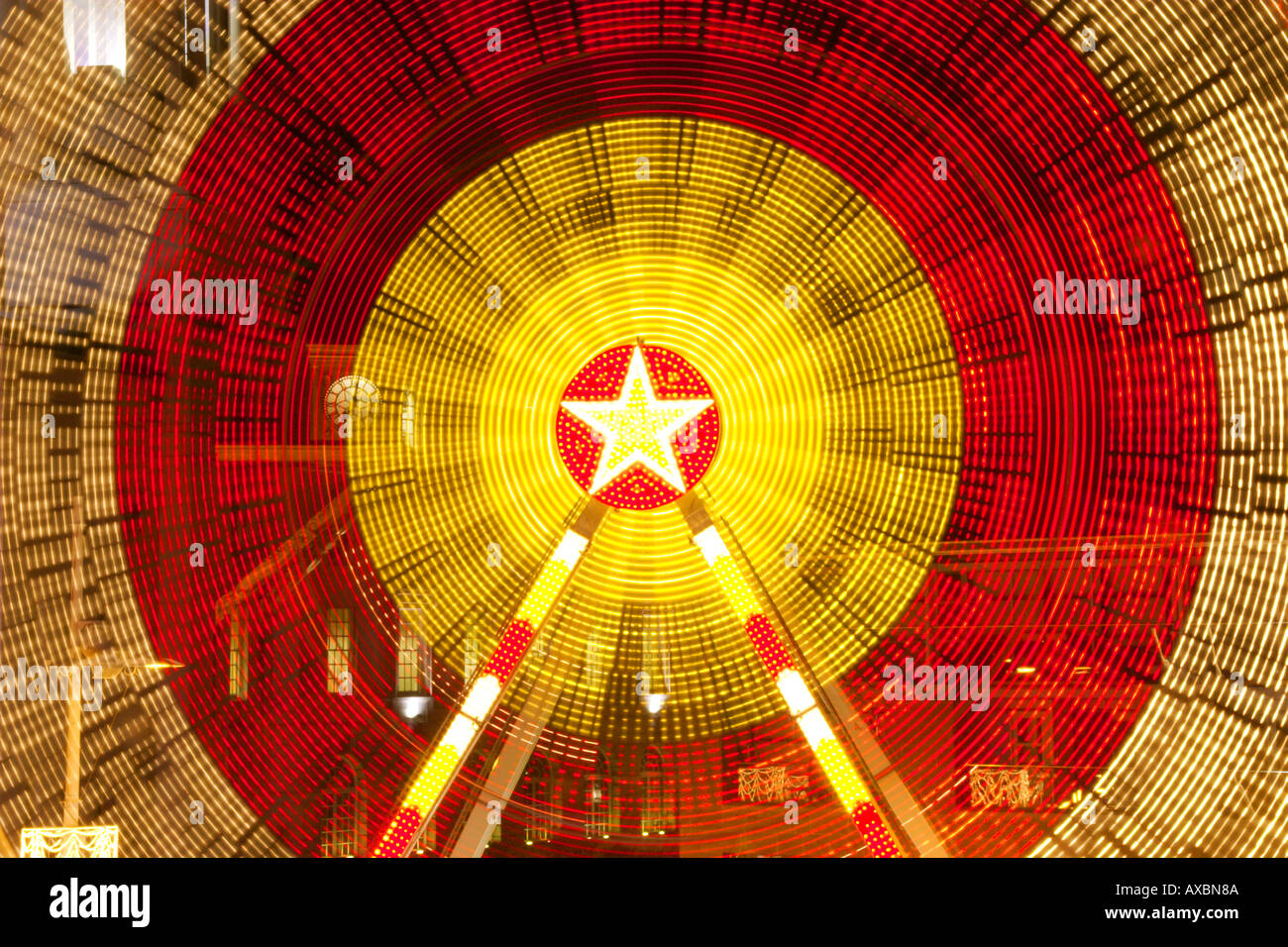 Spinning big wheel fairground ride Stock Photo - Alamy