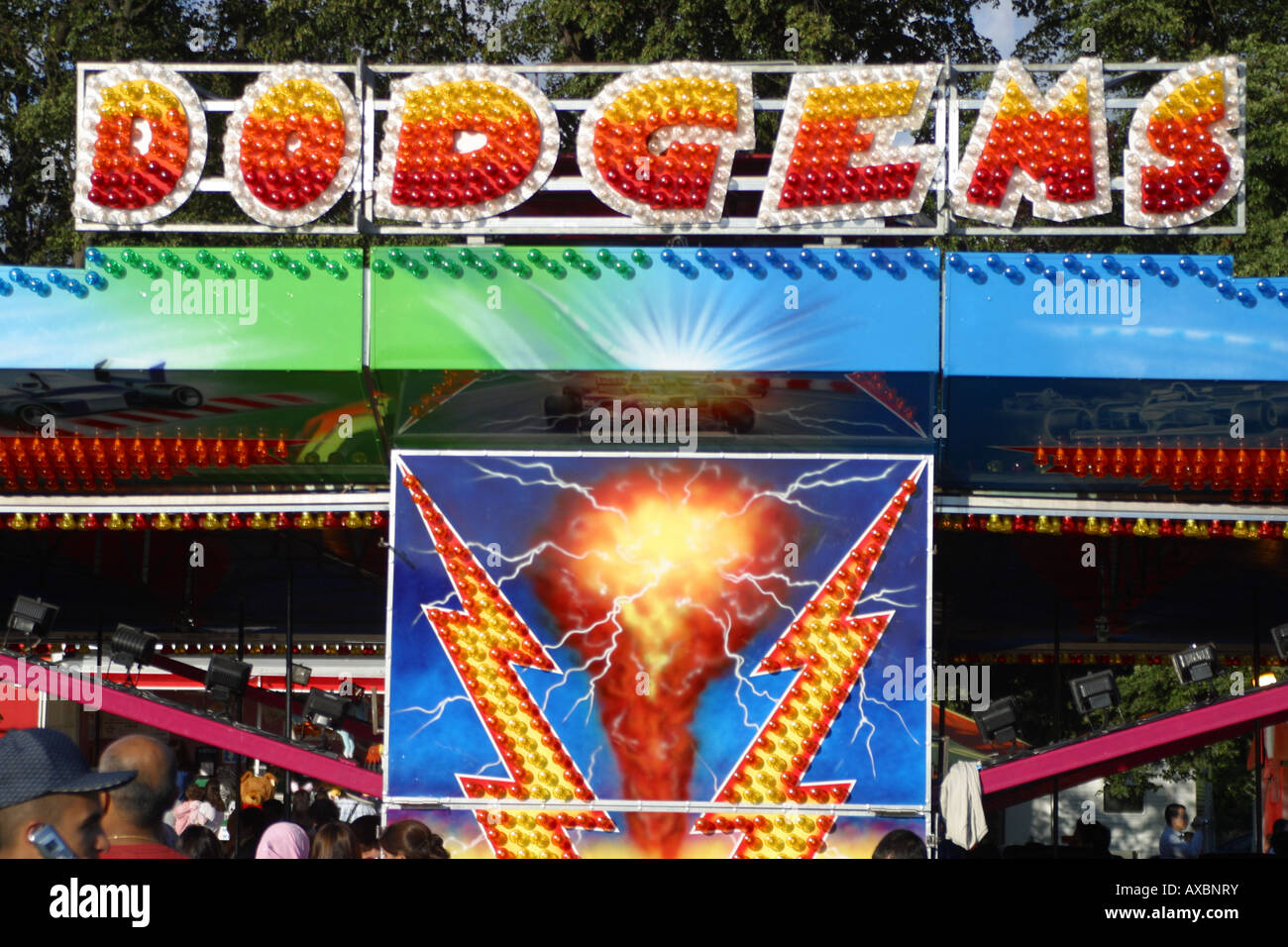 brightly painted fairground attraction ride Stock Photo - Alamy