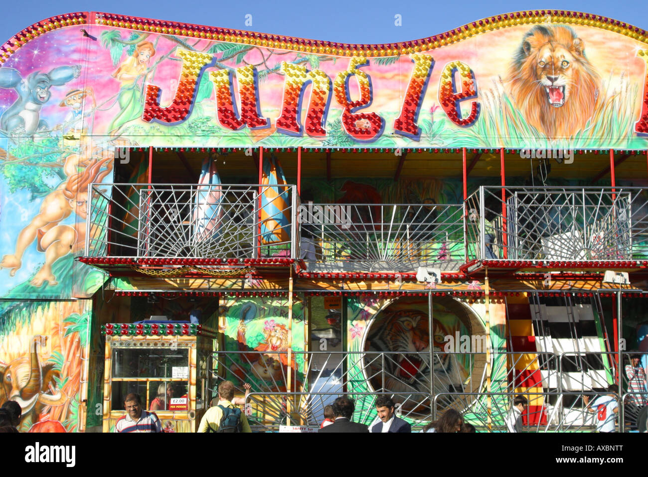 brightly painted fairground attraction ride Stock Photo - Alamy