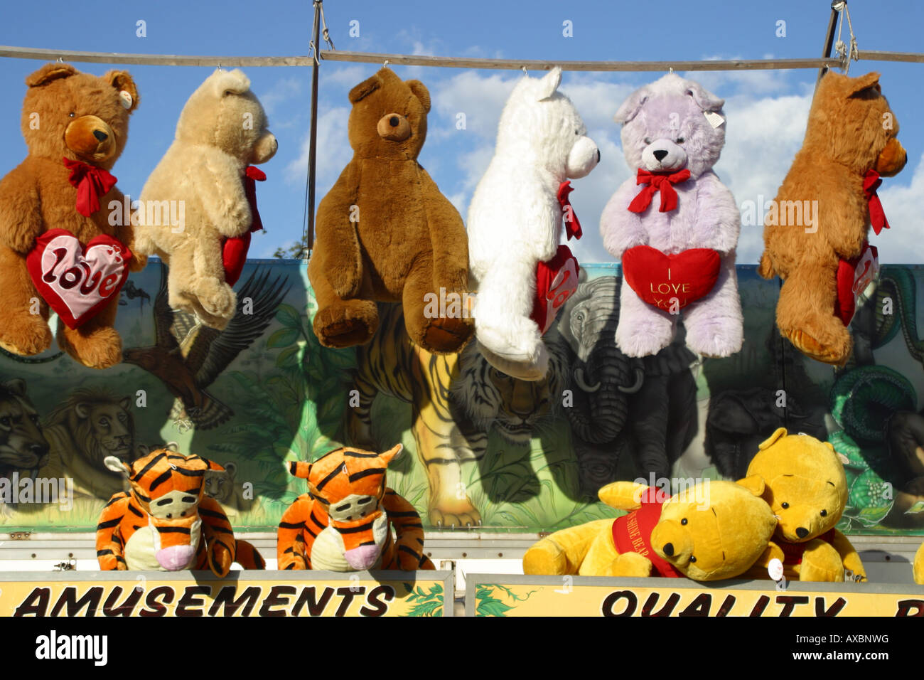 soft bear toys fairground hang hanging display Stock Photo - Alamy