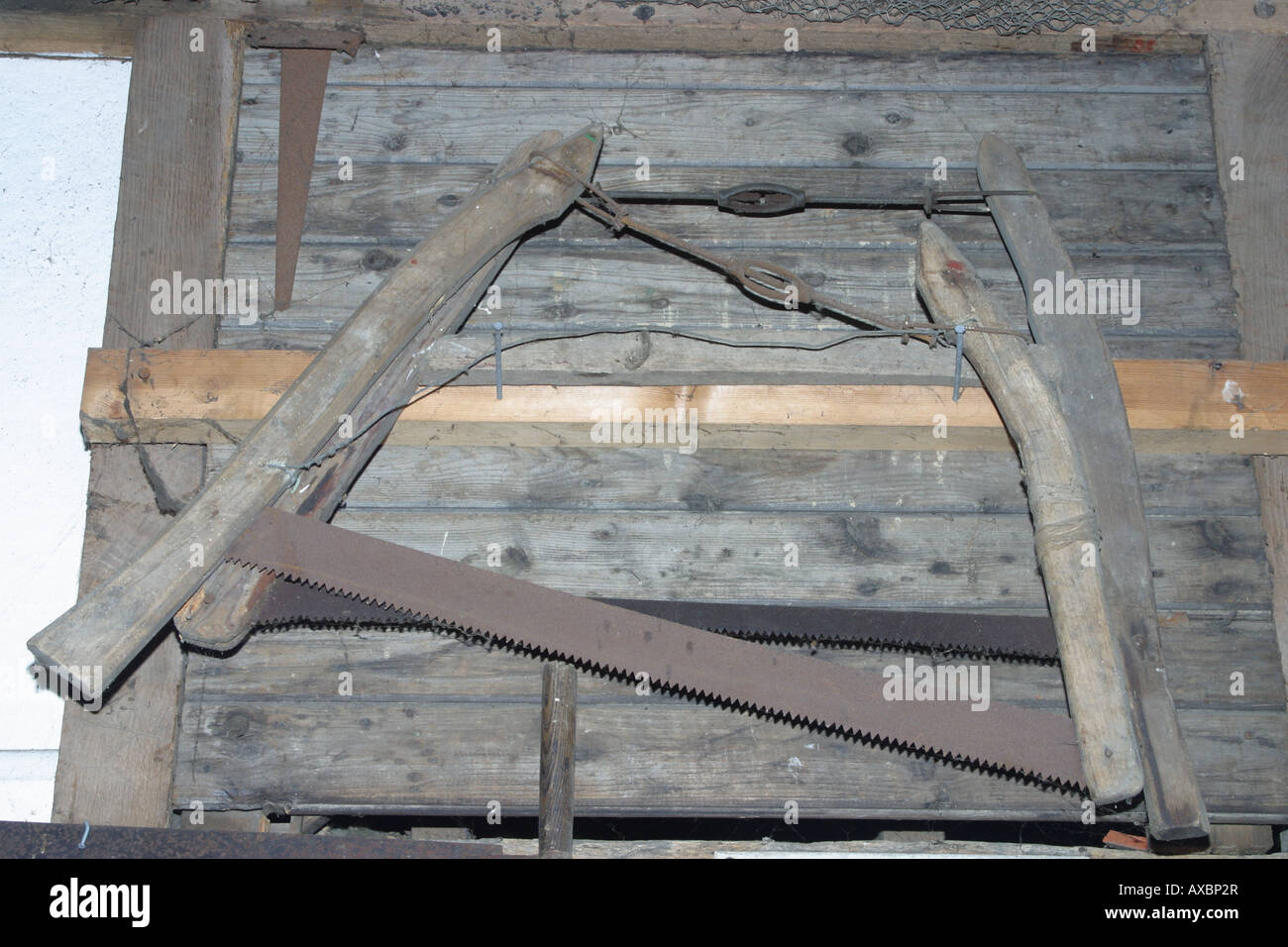 old wood saw cutting implement hanging display yalding kent england uk ...