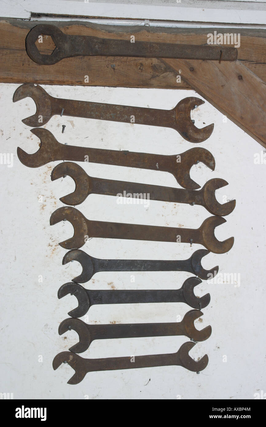 wall display of old very large industrial wrenches yalding kent england ...