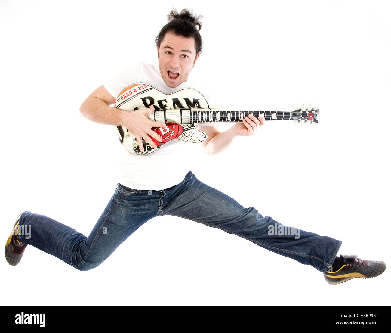 crazy young man with playing air guitar Stock Photo - Alamy