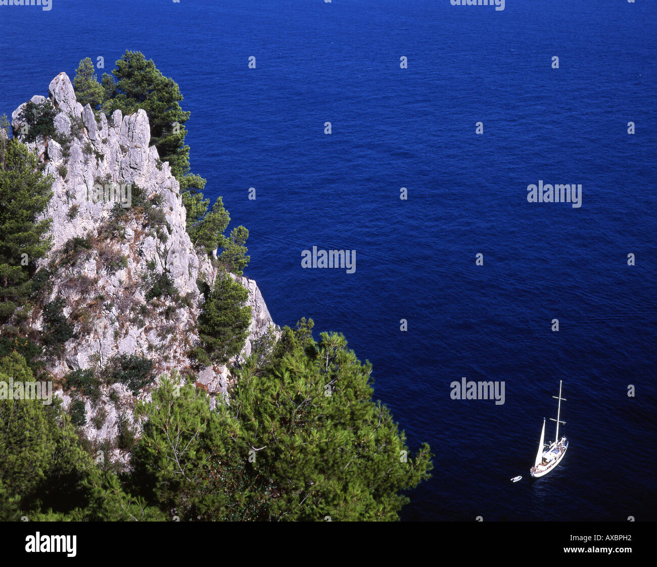 View from Salto di Tiberio down to yacht in sea Capri Campania Italy ...