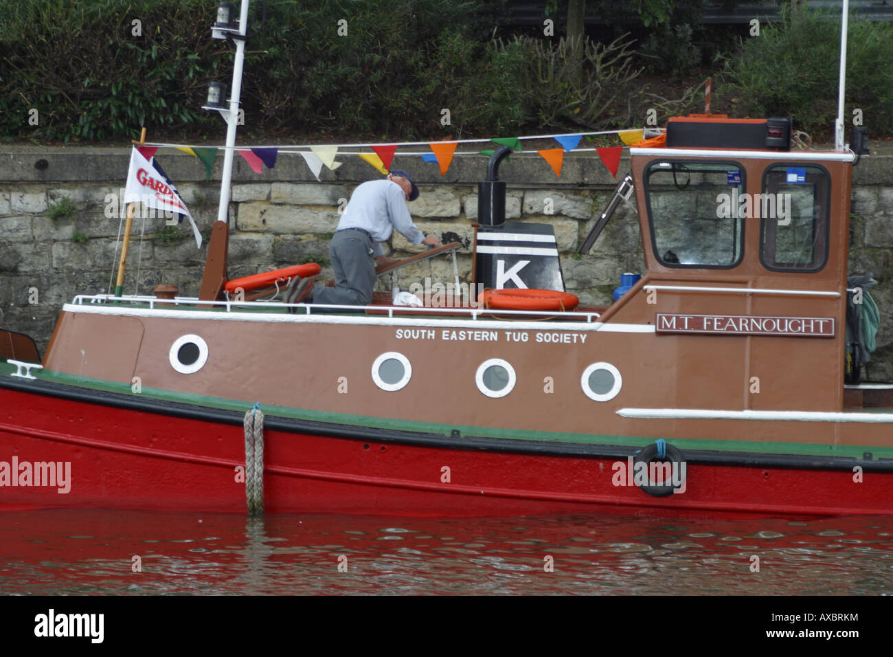 red pleasure boat boating bridge portholes helm maidstone kent england ...