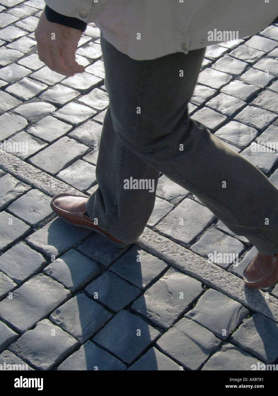 detail of man walking Stock Photo - Alamy