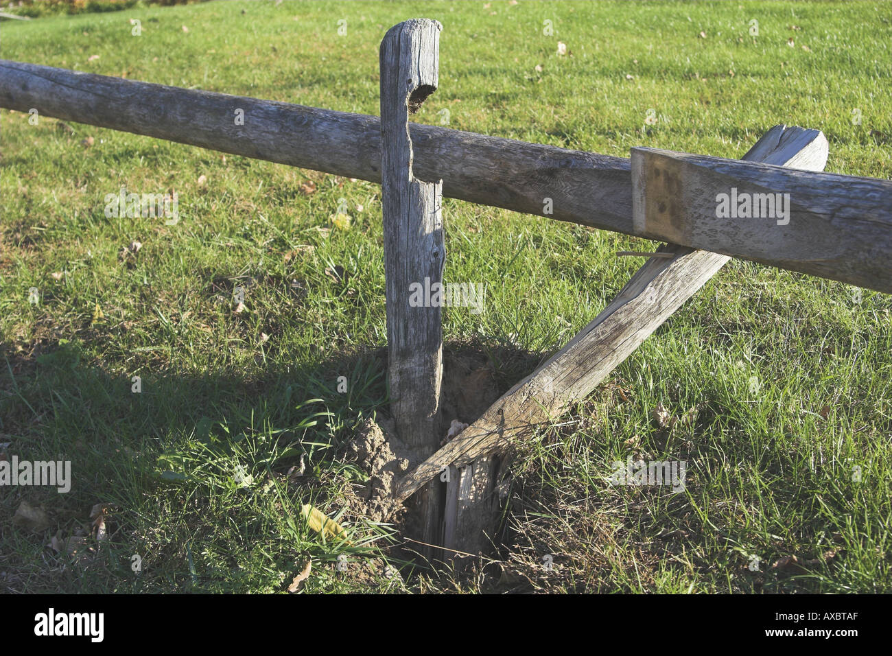 Horizontal image of split rail fence, broken in country setting with ...