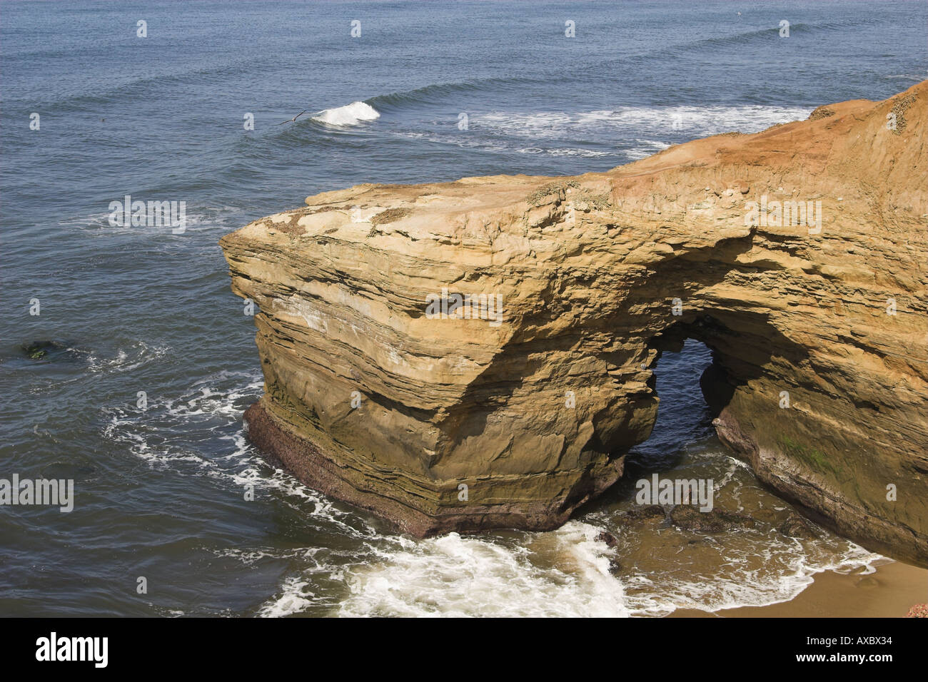 rock and sand formations on beach in Southern California Stock Photo ...