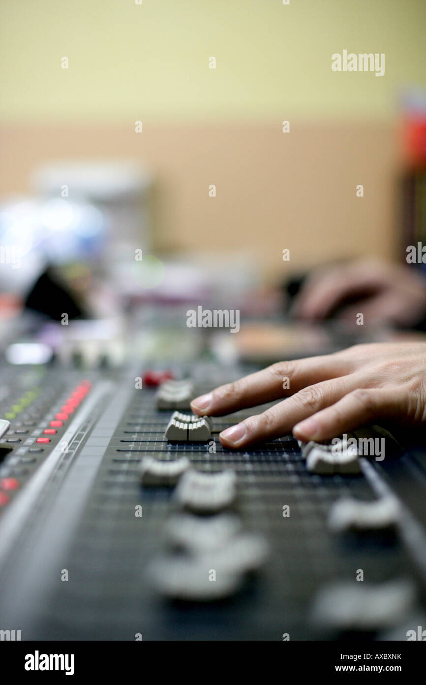 hands on control keyboard Stock Photo - Alamy
