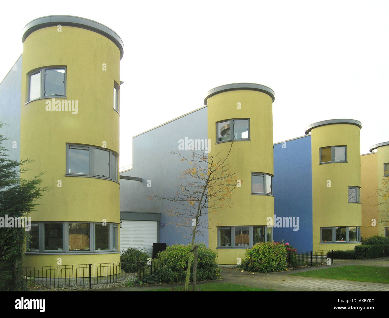 Three identical houses hi-res stock photography and images - Alamy