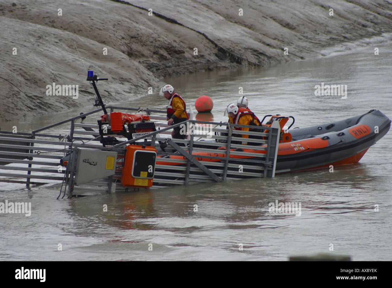 rescue boat trailor lifeboat crew launch training Stock Photo - Alamy