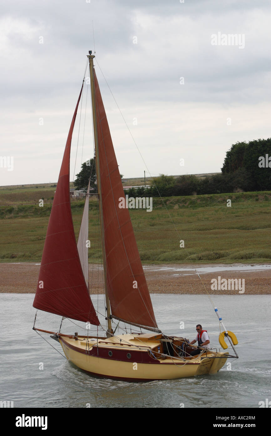 red triangle raised yellow hull boat sailor river rother rye east ...