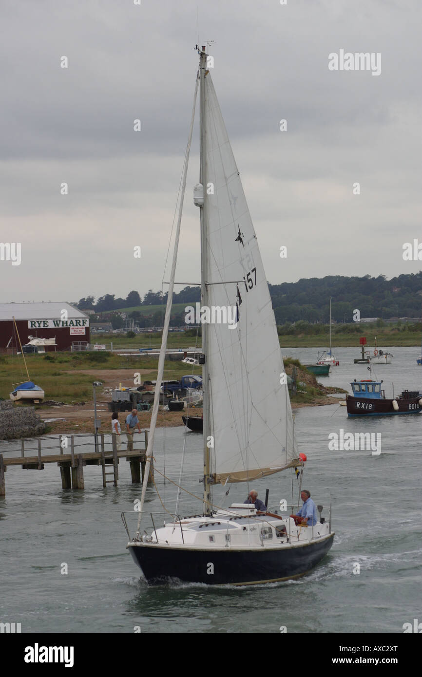 white triangle raised yellow hull boat cloudy river rother rye east ...