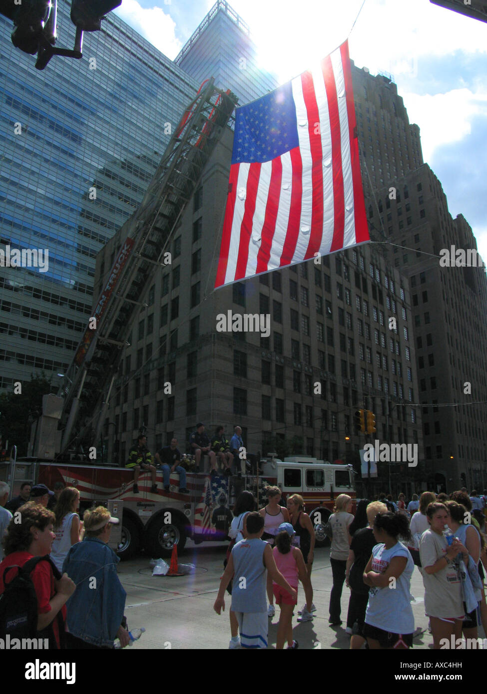 American flag on ladder of fire brigade car during a september 11th ...