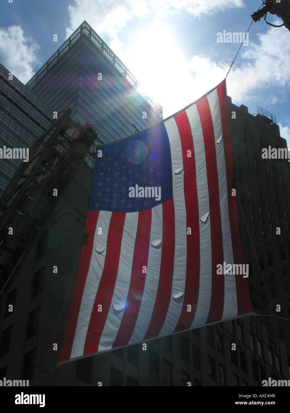 American flag on ladder of fire brigade car during a september 11th ...