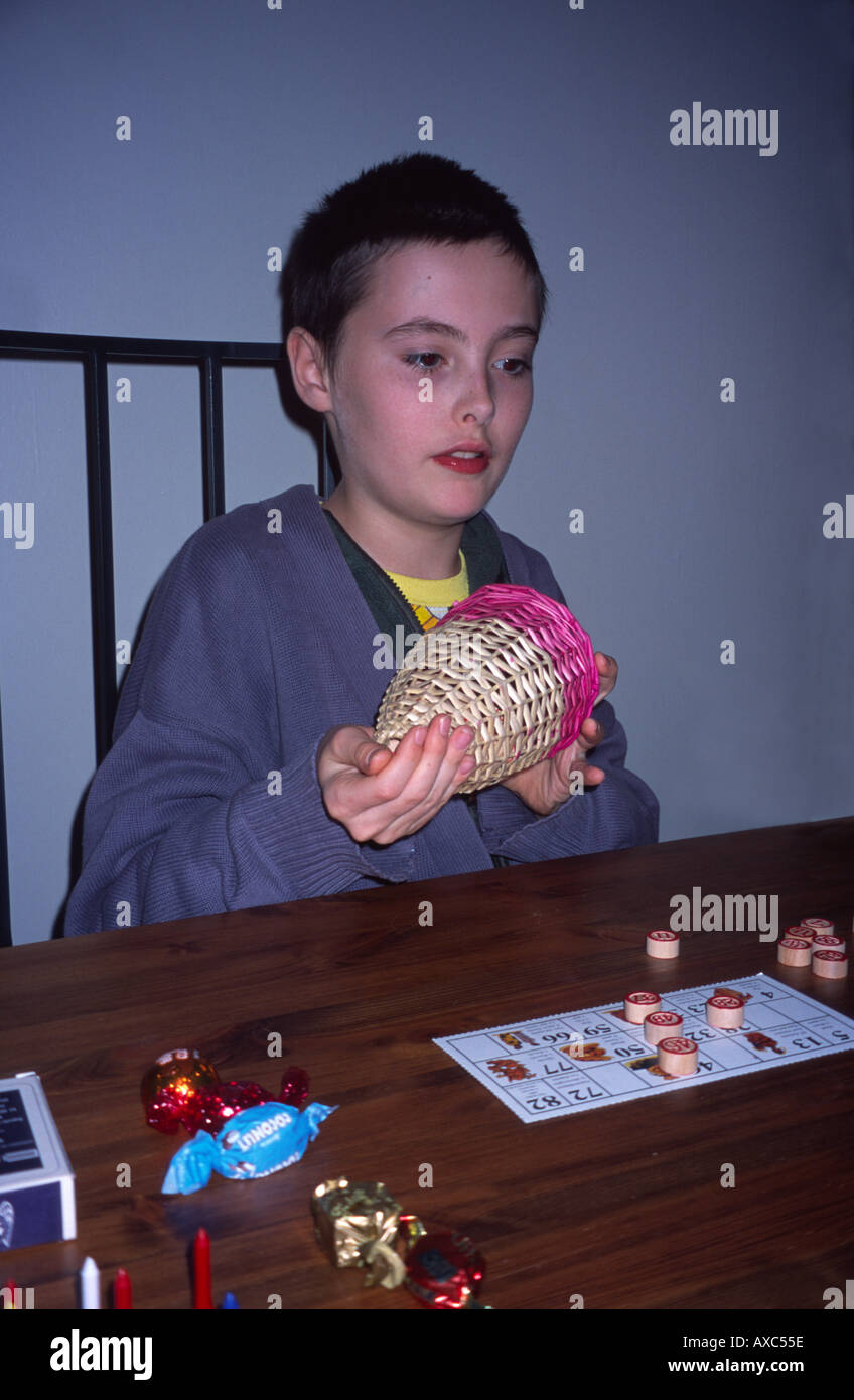 Boy playing Bingo board game London, England UK Stock Photo - Alamy